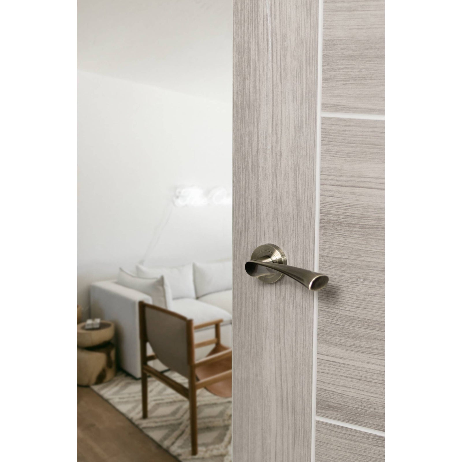 STATUS Colorado Lever Door Handle on Round Rose - Antique Brass - S34R